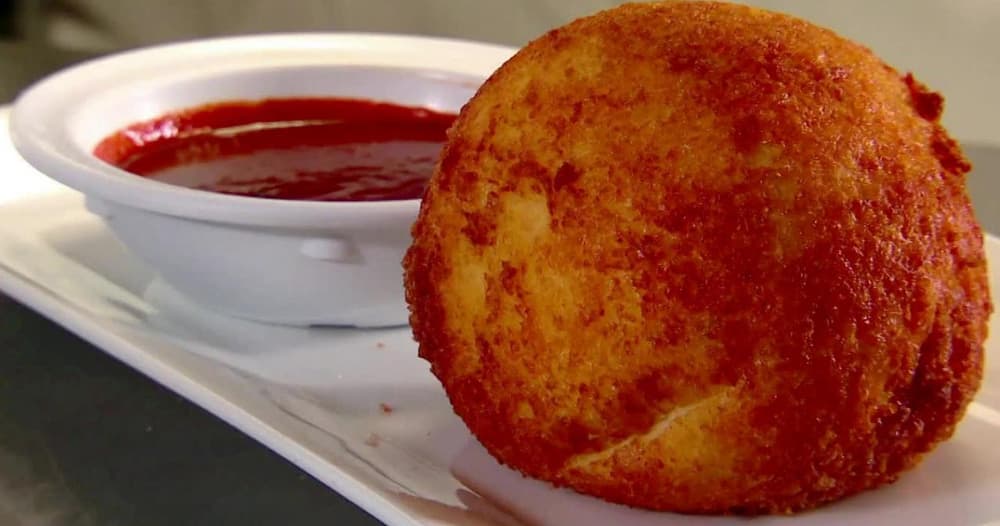 Papa Rellena Con Salsa Ranchera (Stuffed Potato with Spicy Creole Sauce ...