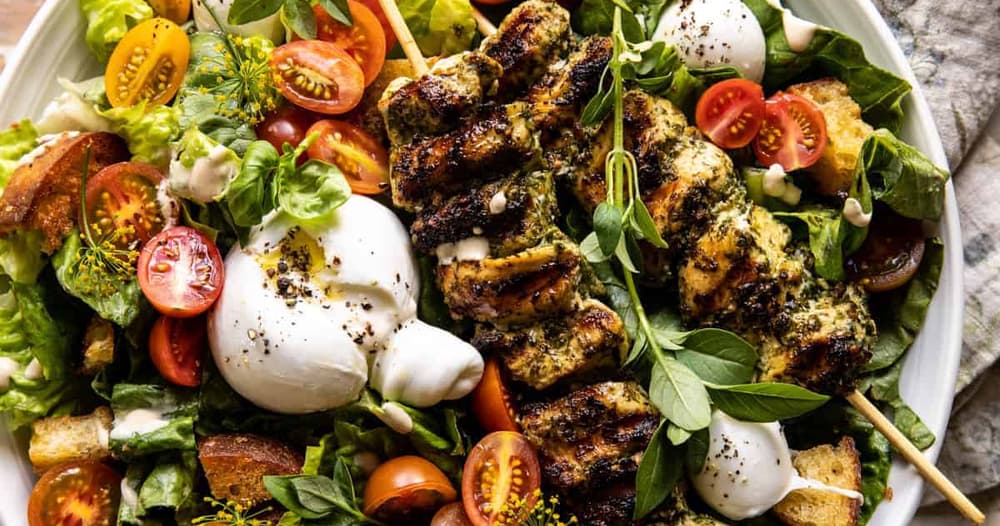 Pesto Chicken Caesar Salad with Tomatoes and Burrata | Punchfork