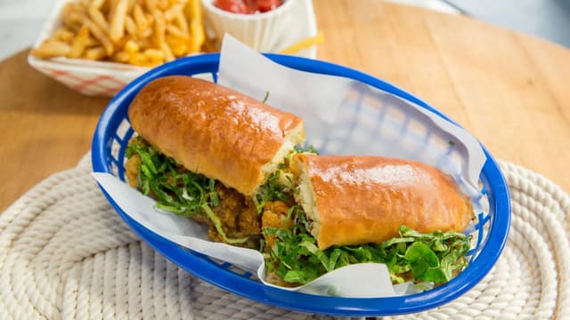 Buttermilk Fried Clam Roll with Spicy Pickle Dressing | Punchfork