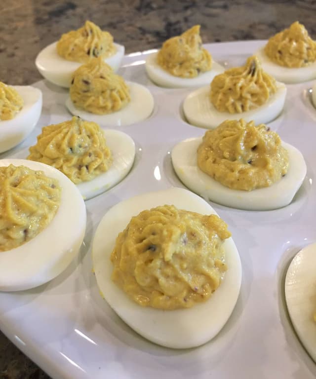 Fabienne's Black Olive and Curry Deviled Eggs | Punchfork