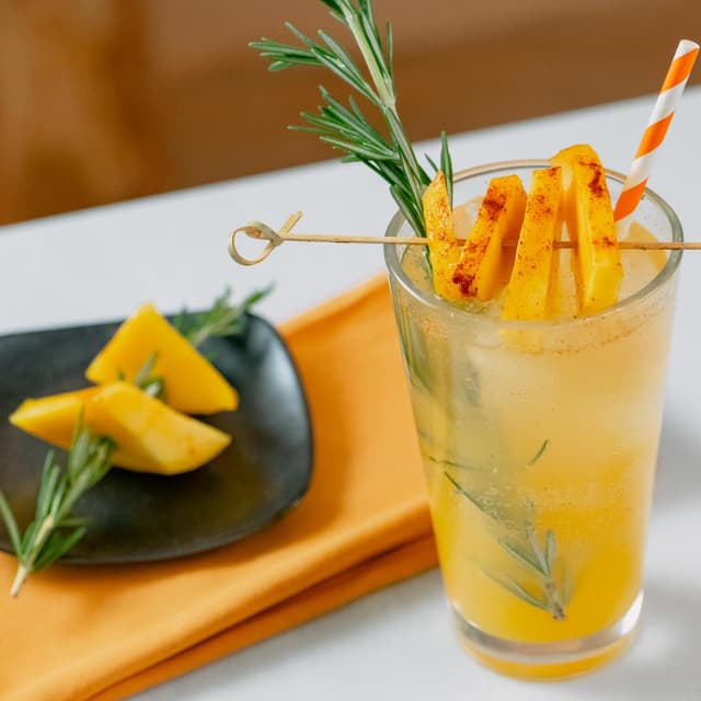 Orange Mango Apple Fizz with Spicy Mango | Punchfork