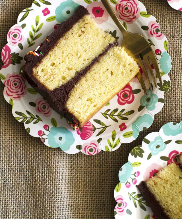 Yellow Birthday Cake with Chocolate Buttercream Frosting | Punchfork