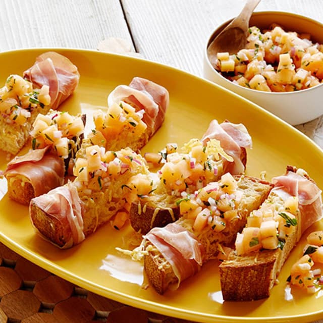 Prosciutto-Wrapped Crostini with Melon Salsa Crudo | Punchfork