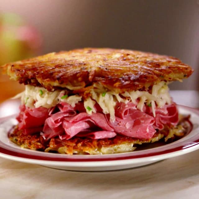 Latke Corned Beef Sandwich with Apple and Sour Cream Slaw | Punchfork