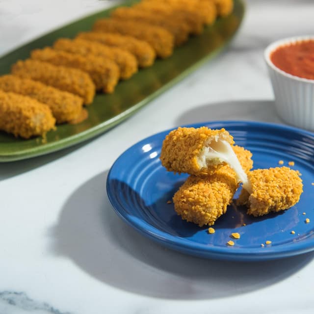 Nacho Cheese Corn Chip-Encrusted Mozzarella Sticks | Punchfork