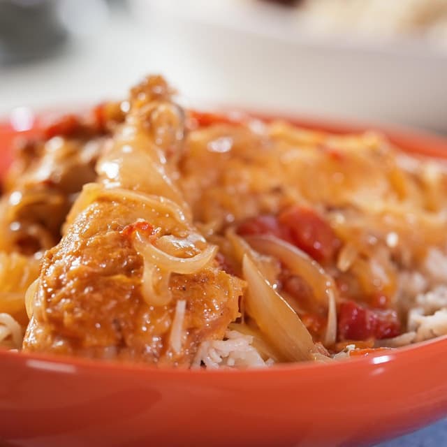 Tomato and Coconut Chicken Over Spiced Rice Pilaf | Punchfork