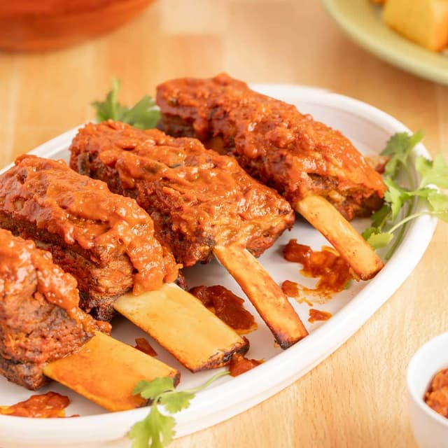 Braised Beef Short Ribs Recipe - With Spicy Sauce | Punchfork