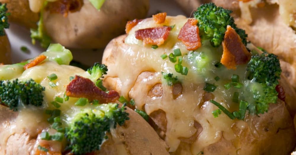 Mile High Loaded Baked Potatoes | Punchfork