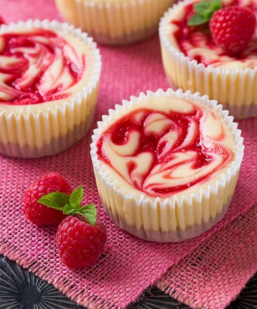 Raspberry Swirled Mini Cheesecakes | Punchfork