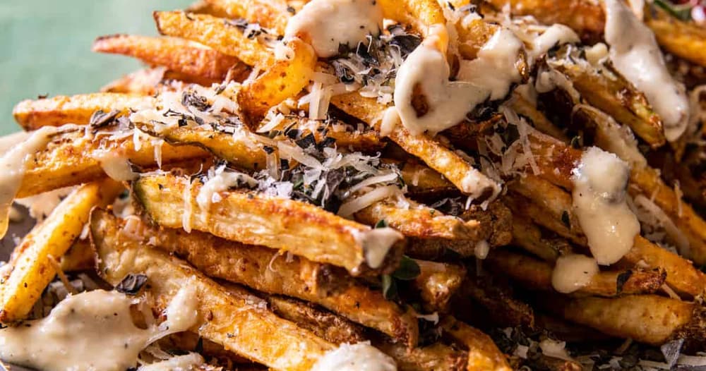 Garlic Parmesan French Fries Dressed in Caesar Dressing | Punchfork