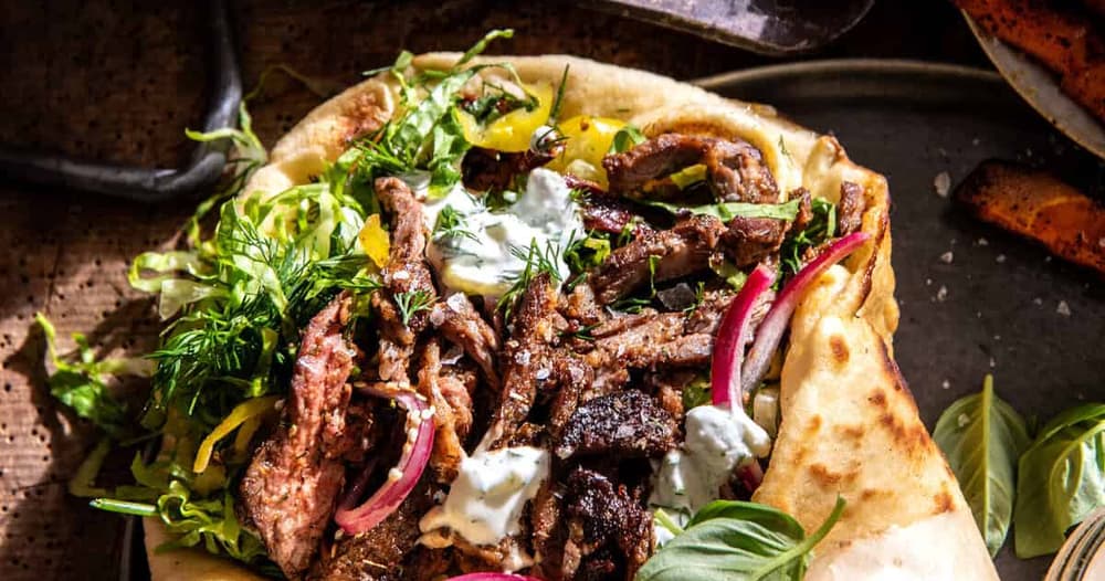 Sheet Pan Steak Gyros with Feta Tzatziki Sauce | Punchfork