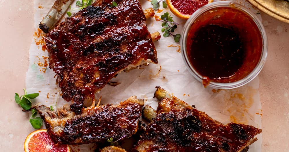 Smoky Blood Orange BBQ Ribs with Avocado Butter Greens | Punchfork