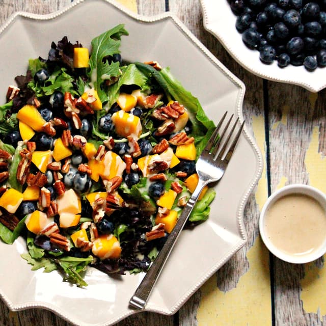 Blueberry and Mango Salad with Tahini Ginger Dressing | Punchfork
