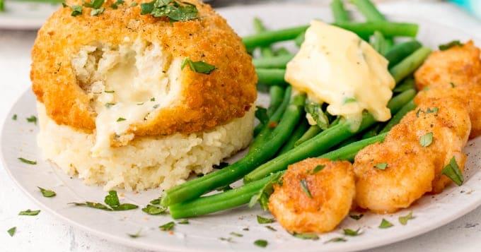 Saucy Fish Co. Fishcakes with Cheesy Mash and Crispy Garlic Prawns ...